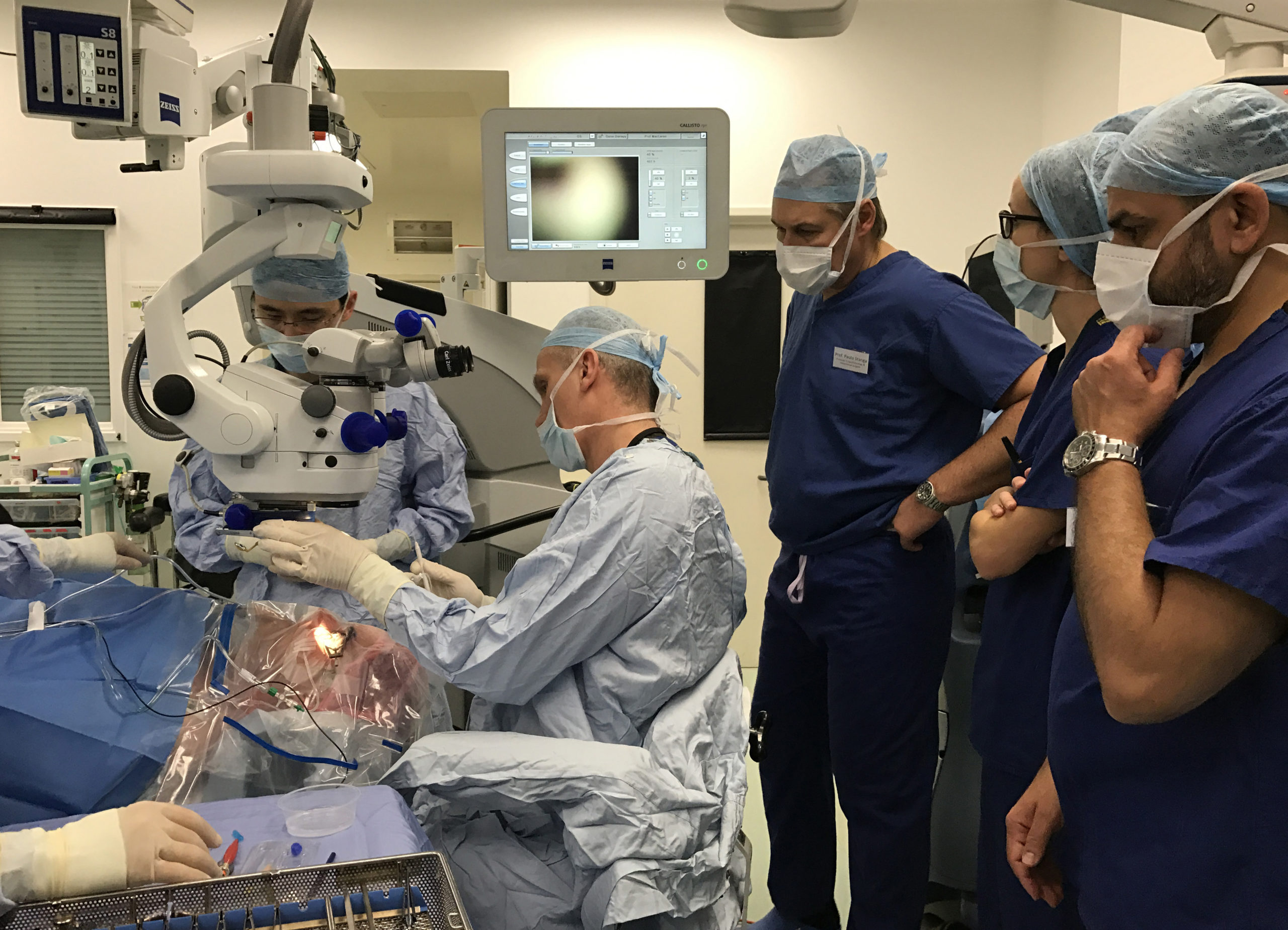 The-surgical-team-prepares-to-inject-the-virus-into-the-back-of-the-eye ...